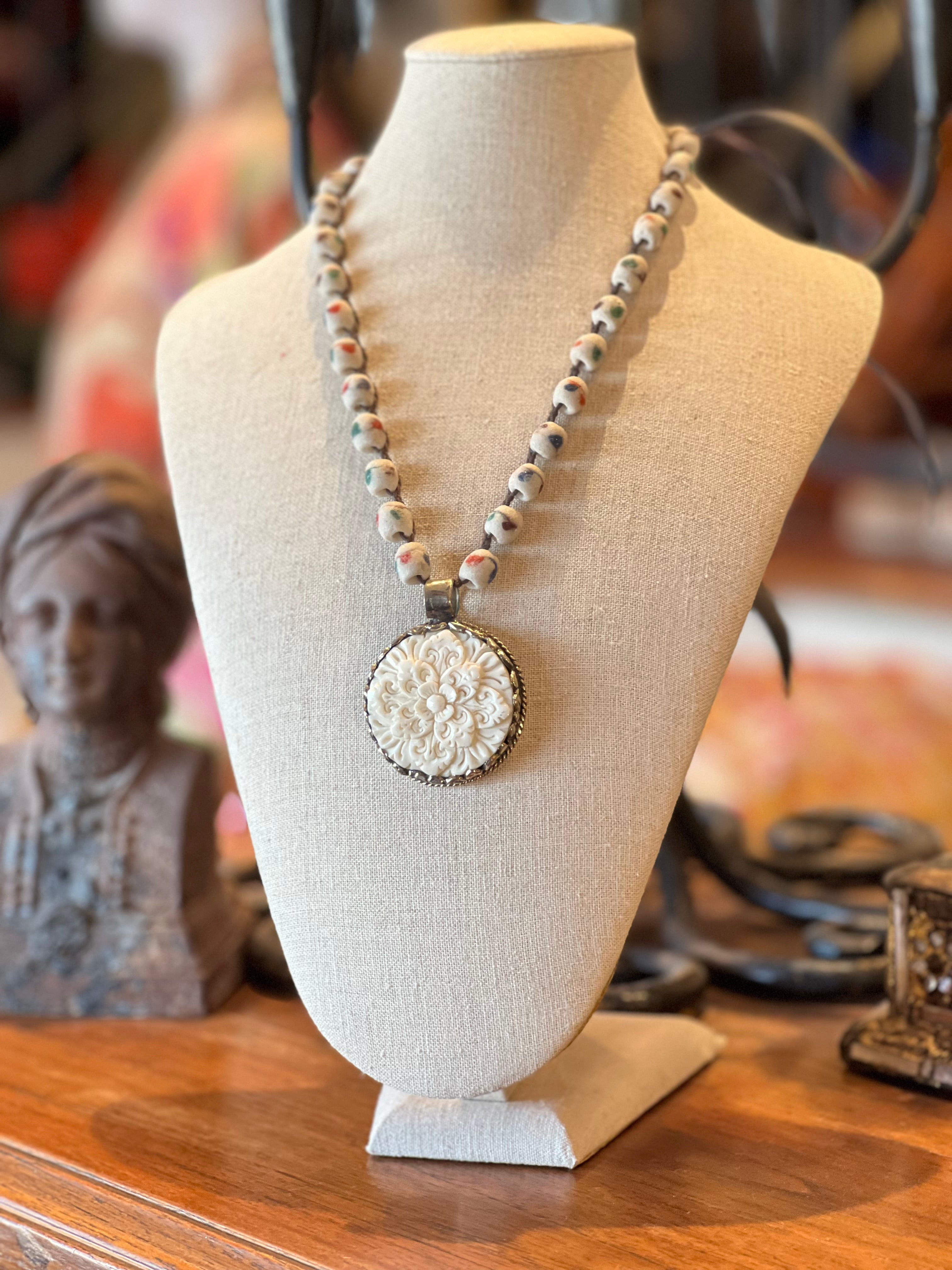 Carved Bone Pendant 1230 – Chateau Bel Age Boutique